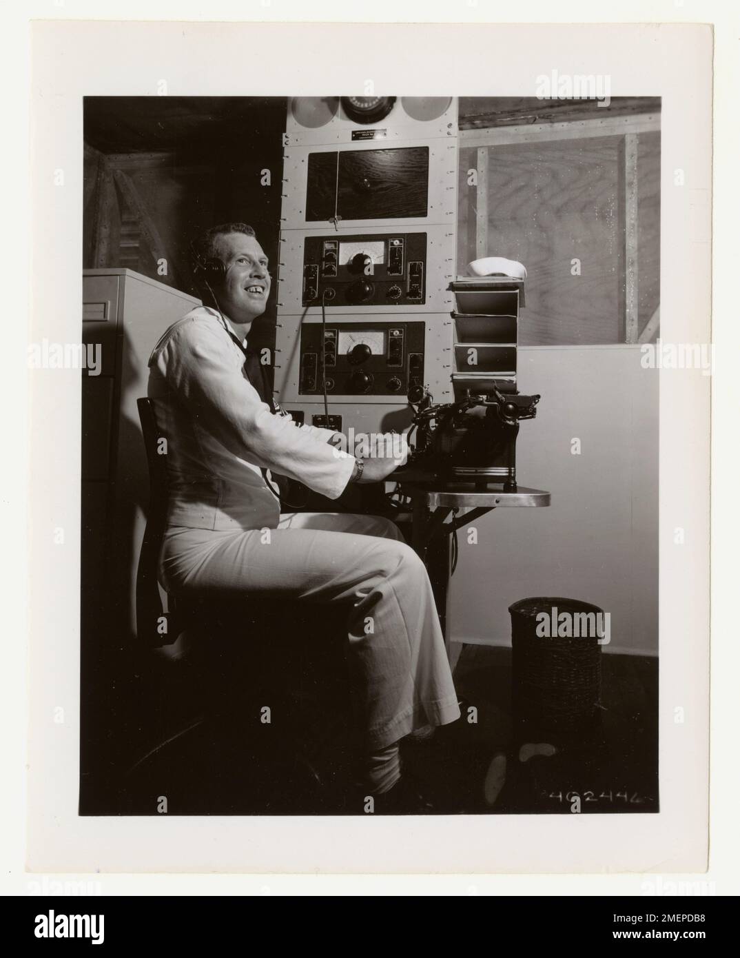 RM 1/c Robert Boughton, a radio technician from San Bruno, California ...