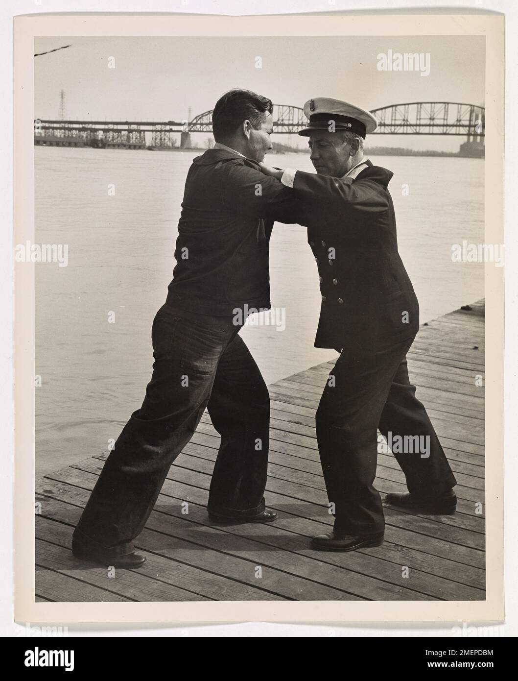 A dramatic moment as Rollston engages in a physical struggle with the ...