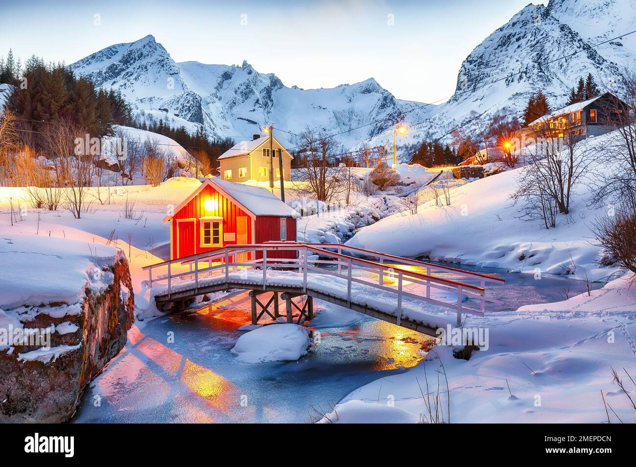 Fabulous evenihg scenery of Norwegian Nusfjord village. Popular travel ...