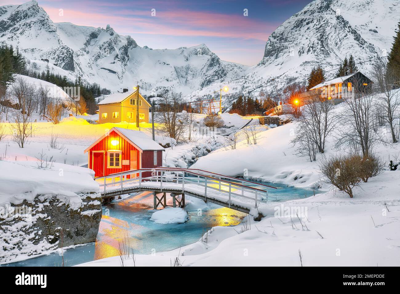 Fabulous evenihg scenery of Norwegian Nusfjord village. Popular travel ...