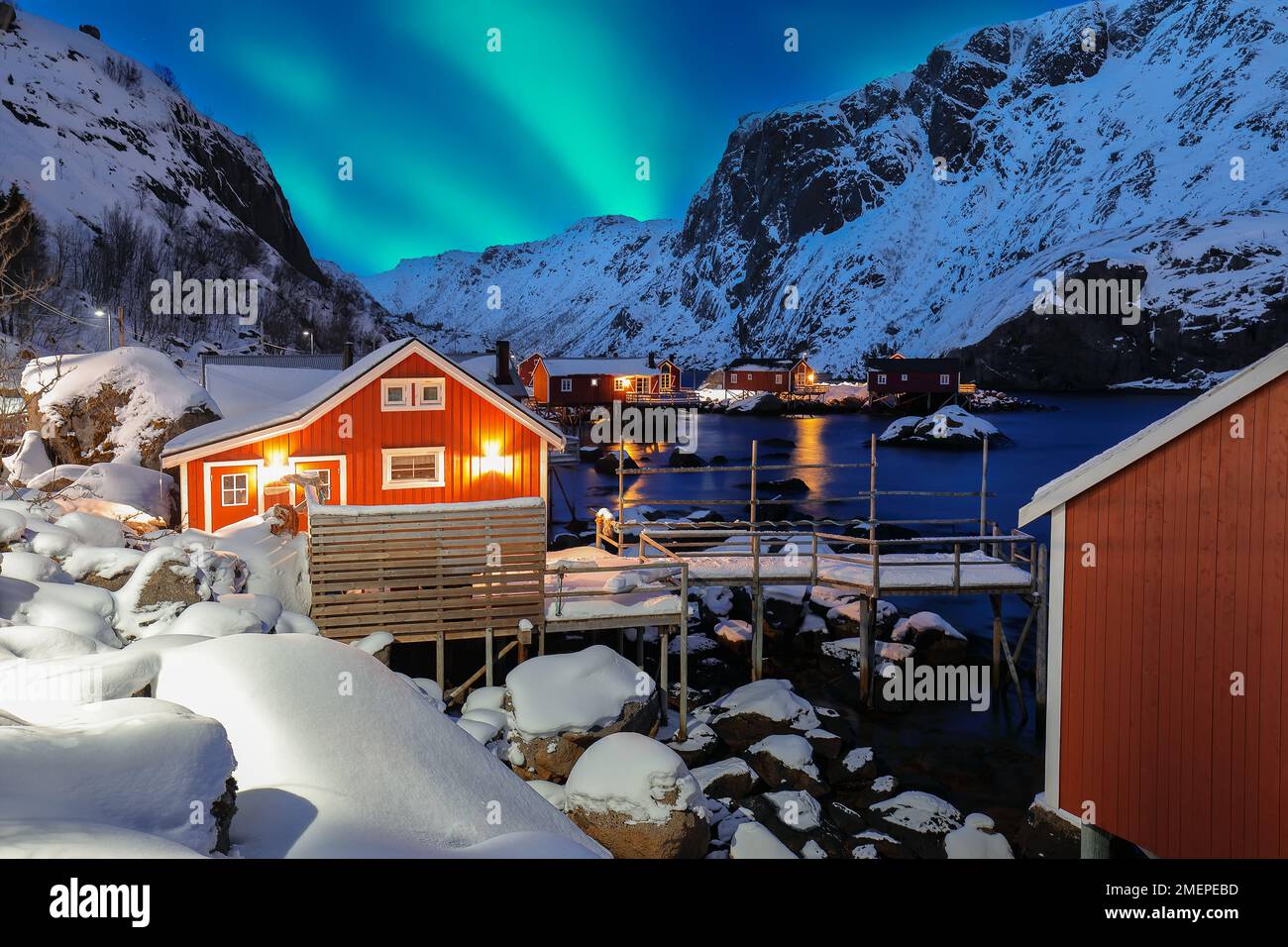 Fabulous evening seascape of Norwegian sea and cityscape of Nusfjord ...