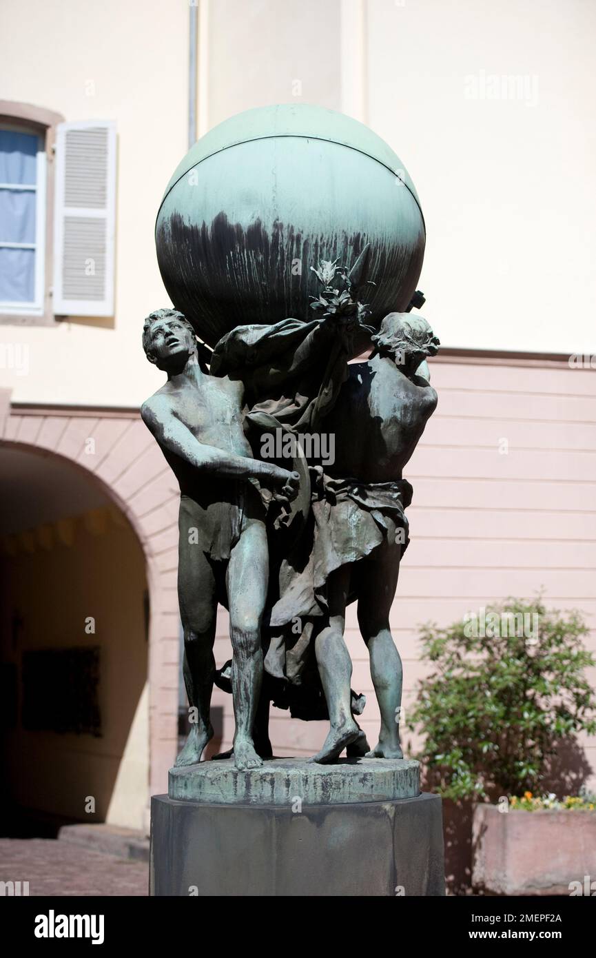 France, Alsace, Colmar, Musee Bartholdi, bronze statue of men holding ...