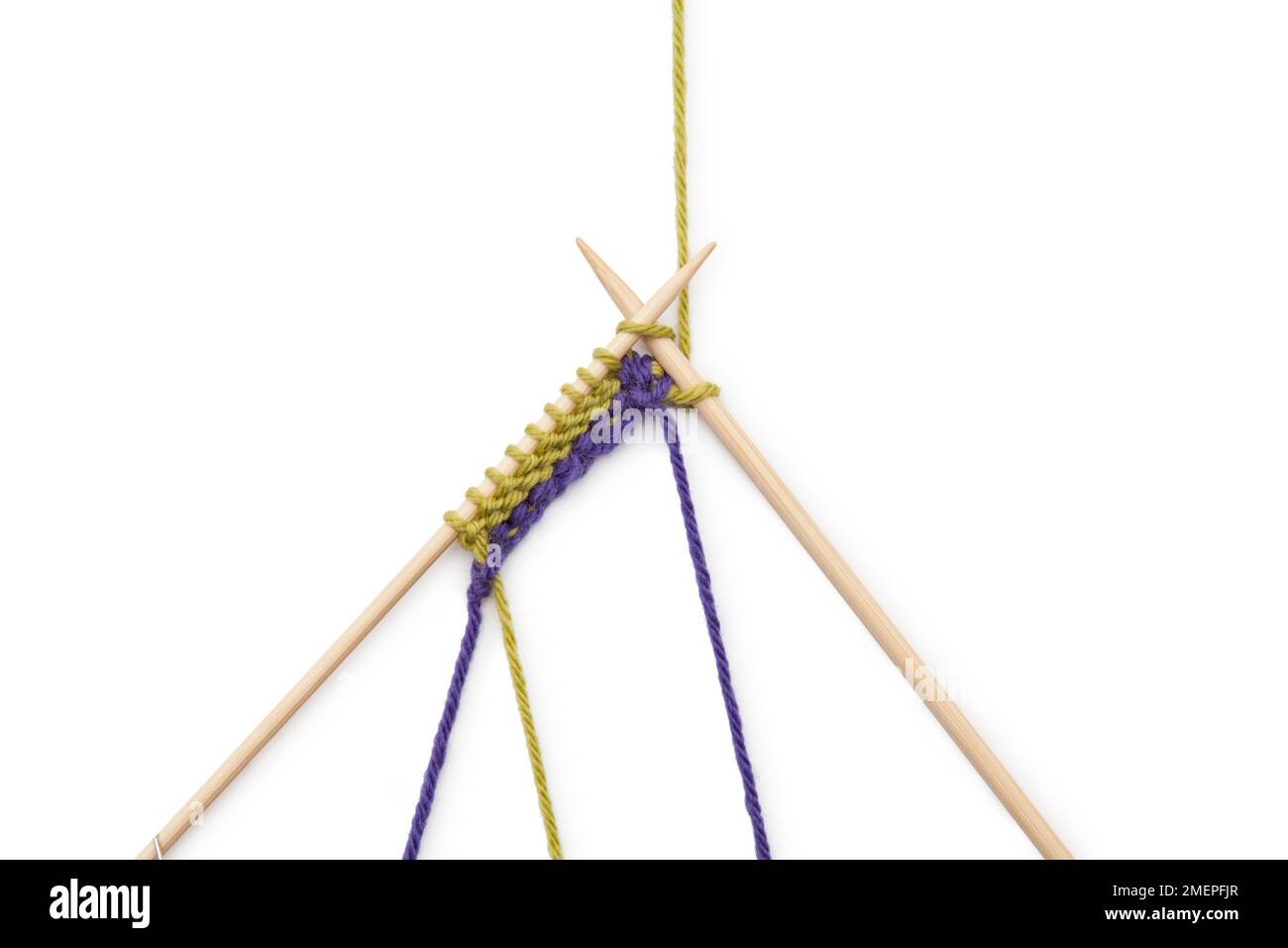 Alternative roll edge tubular cast-on knitting technique Stock Photo ...