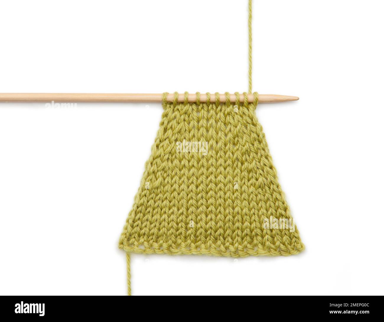 Fully fashioned shaping on a purl row technique Stock Photo - Alamy