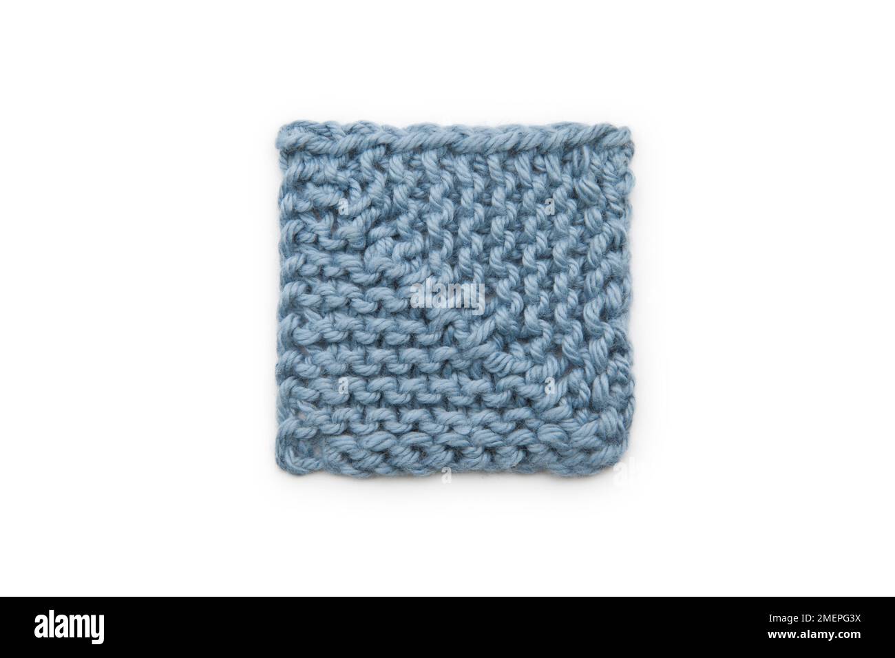 Plain-colour domino squares colourwork knitting technique Stock Photo ...