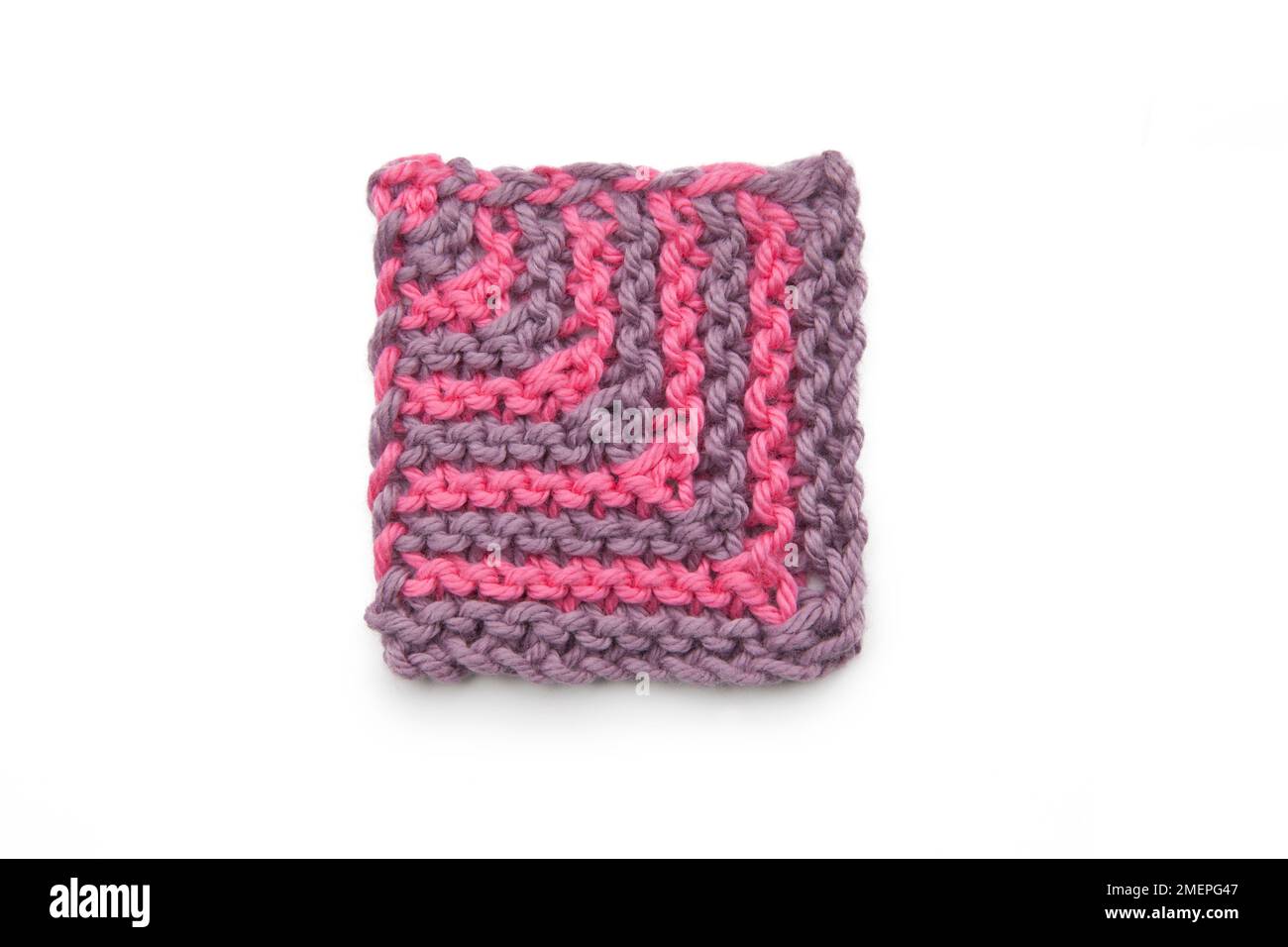 Striped domino squares colourwork knitting technique Stock Photo - Alamy