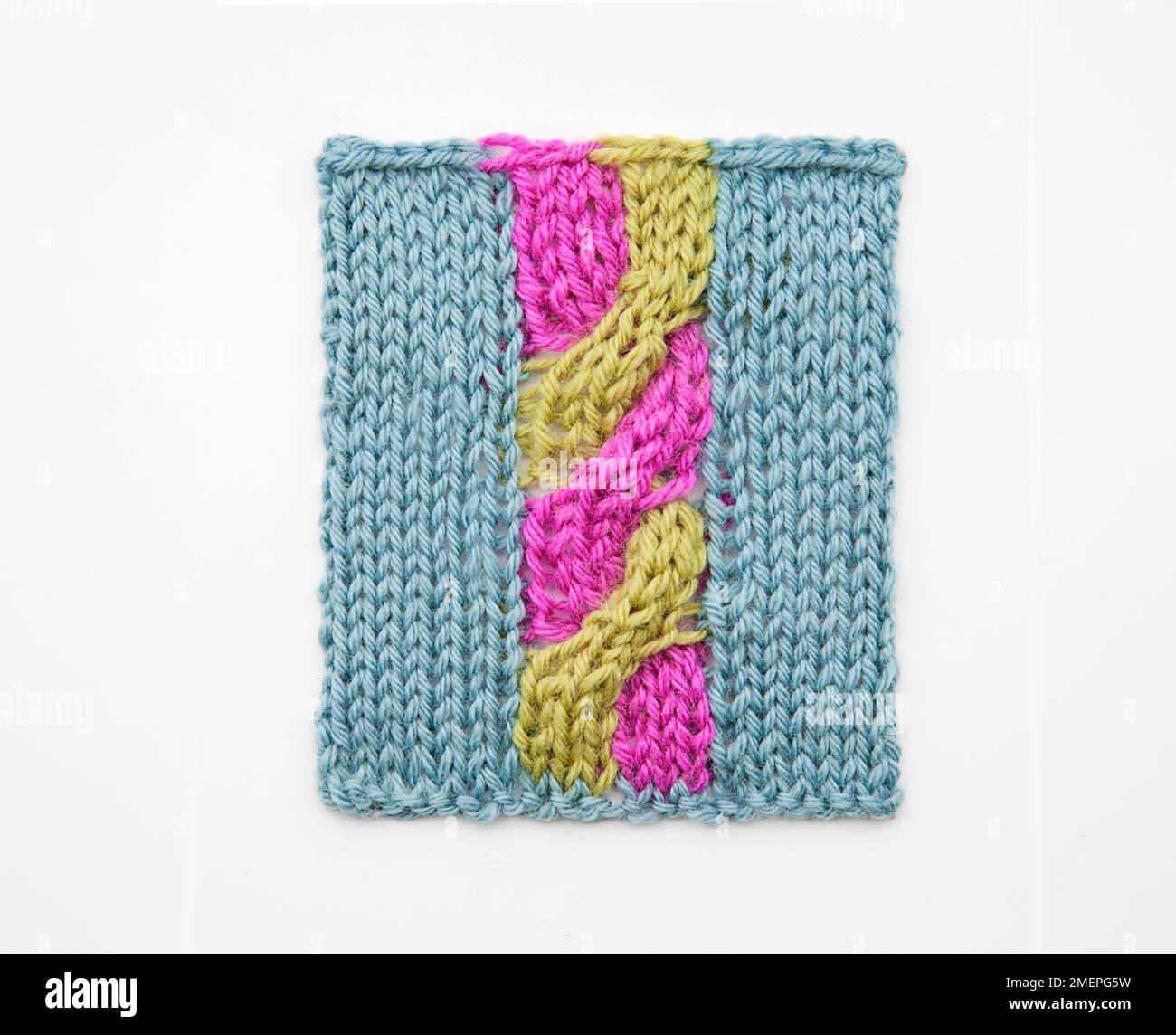 Two-colour cable intarsia knitting technique sample Stock Photo - Alamy