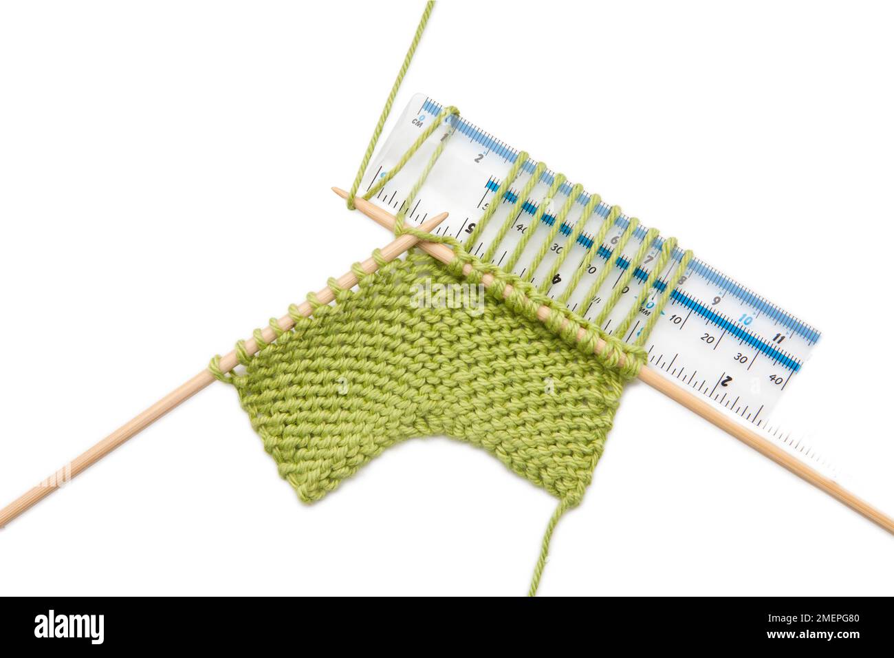 Long loops made with a ruler knitting sample Stock Photo - Alamy