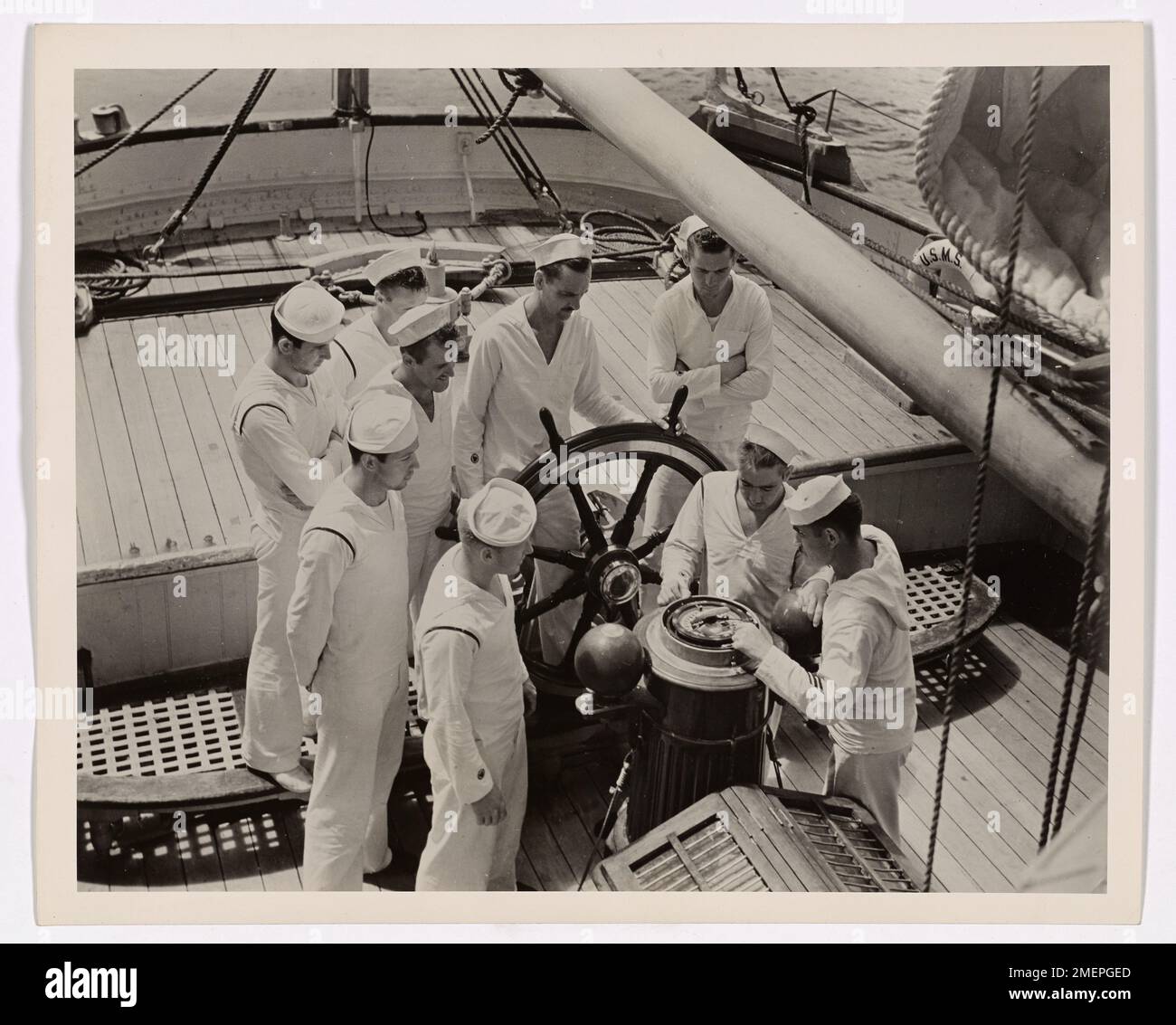 Maritime Service enrollees are shown learning how to use a compass. All ...