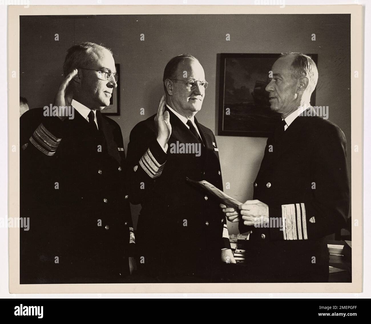 Commodore Joseph F. Farley and Captain Philip B. Eaton are promoted to ...
