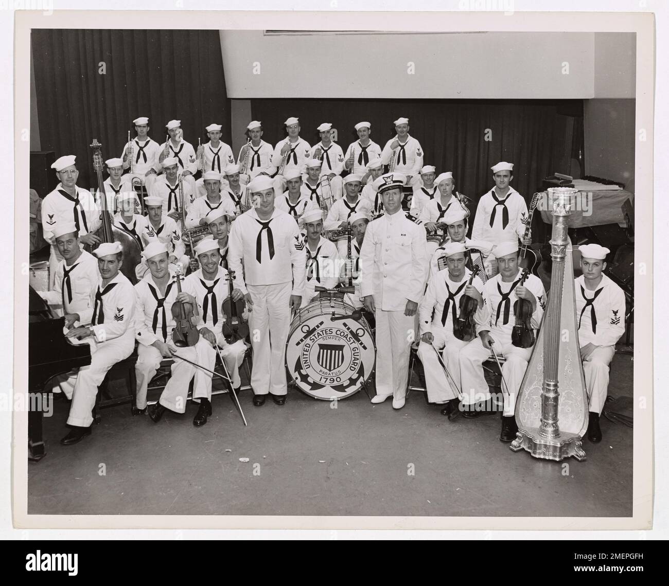 The Eleventh Naval District Coast Guard Band, led by bandmaster ...