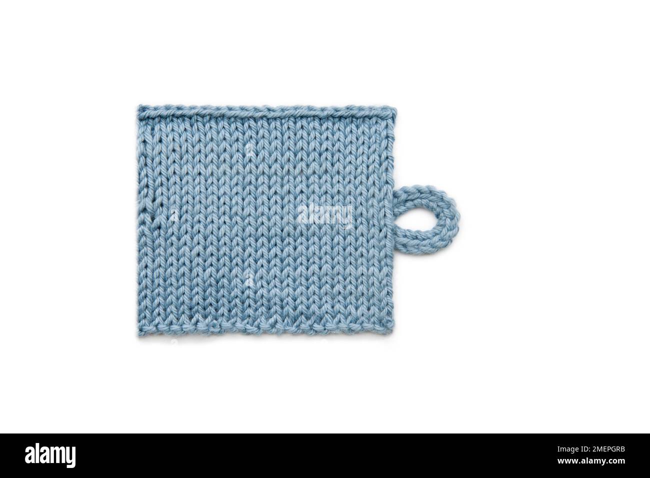 Knitted button loop Stock Photo - Alamy