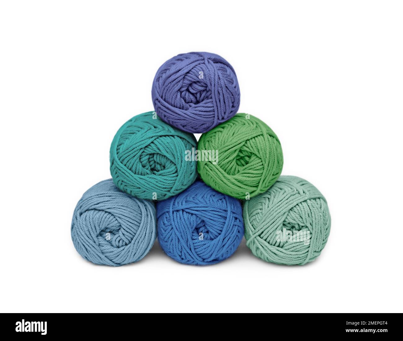 Balls of blue, green and violet yarn in stack Stock Photo - Alamy