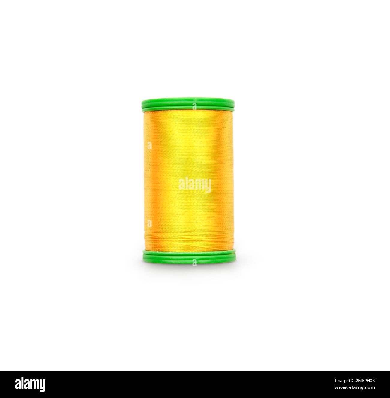 Reel of yellow machine embroidery thread Stock Photo - Alamy