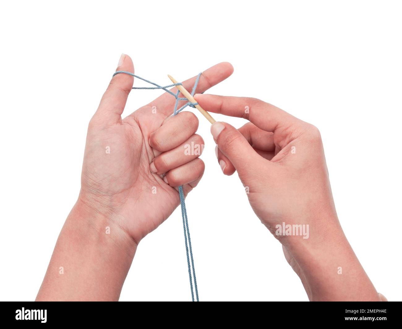 Twisted double cast-on knitting technique Stock Photo - Alamy