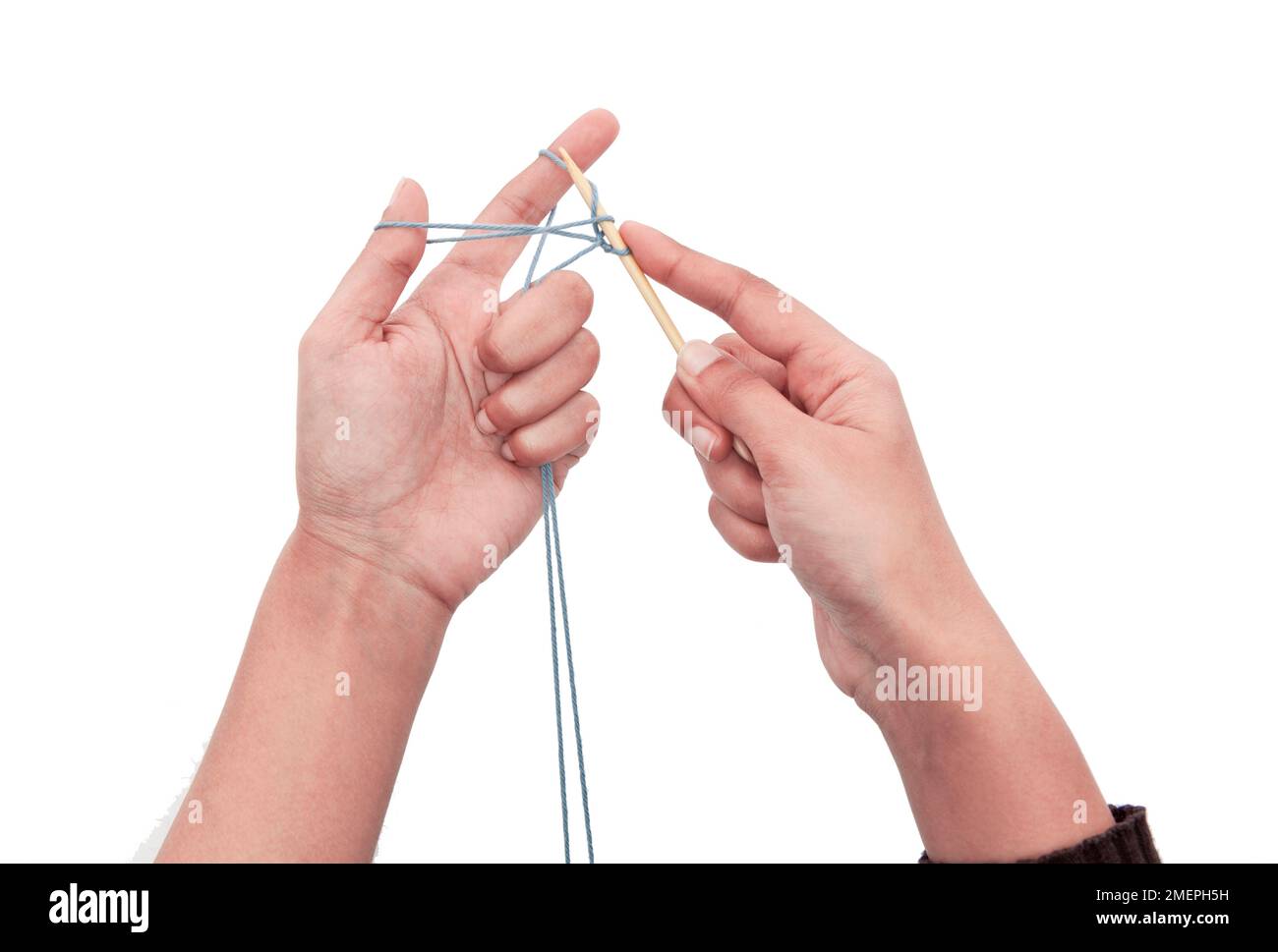 Twisted double cast-on knitting technique Stock Photo - Alamy