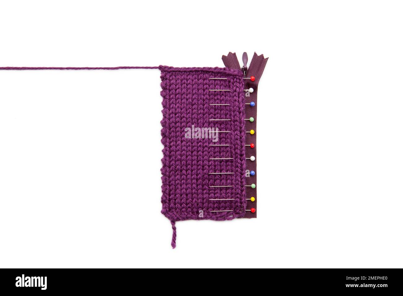 Example of sewing in a zip on knitted a sample Stock Photo - Alamy