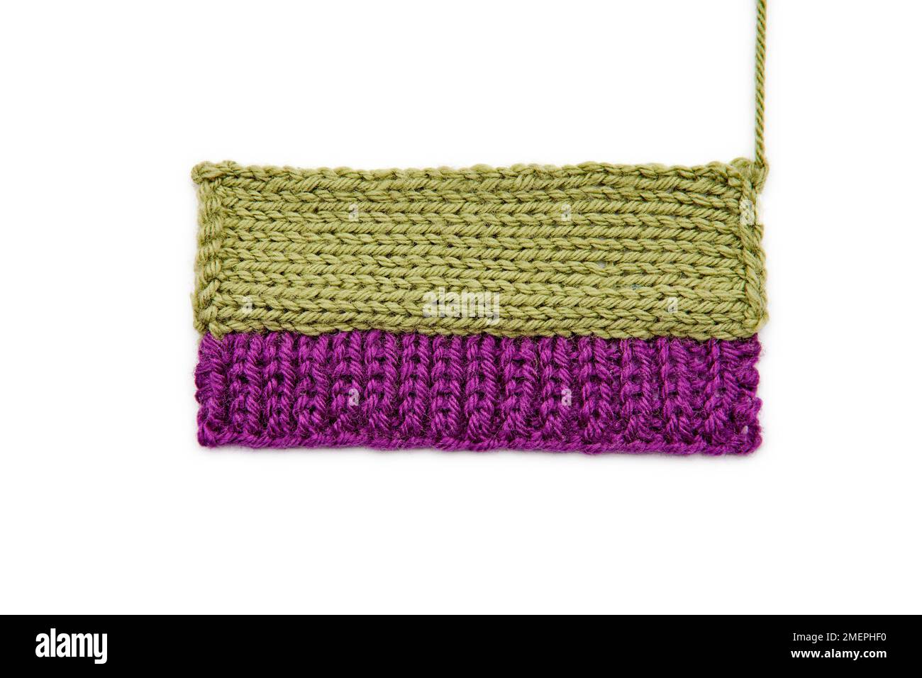 Example of cutting into knitting using steek technique Stock Photo - Alamy