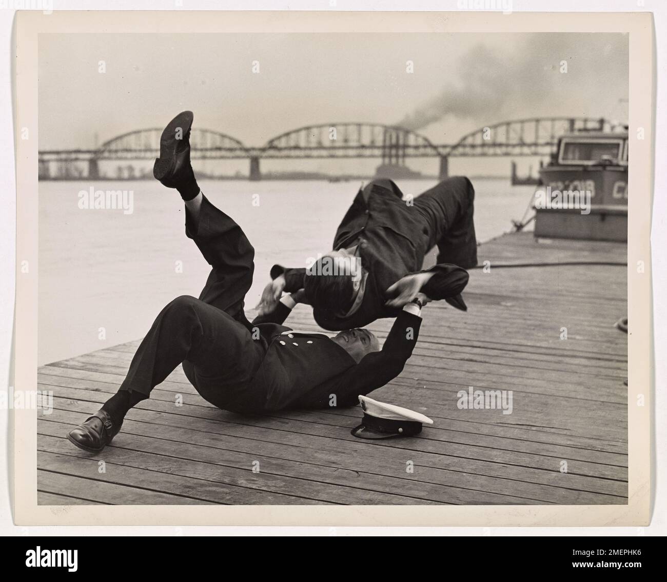 A dramatic moment captured at sea, showing an aircraft under attack ...
