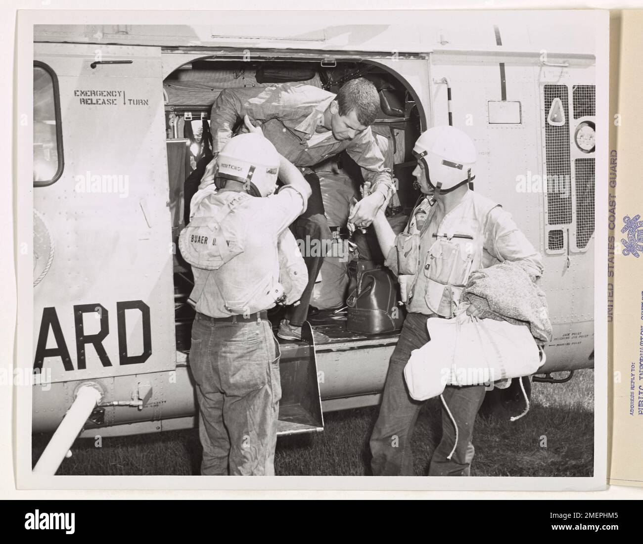 A Coast Guard rescue helicopter lifts an ill seaman from the tanker SS ...