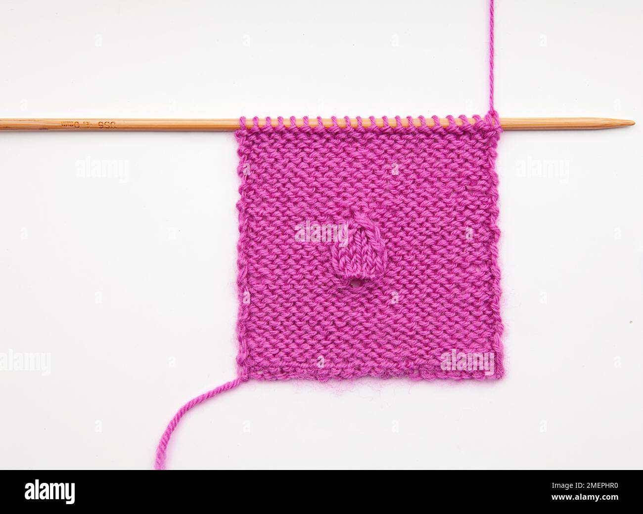 Example of tulip cluster bobble knitting technique Stock Photo - Alamy