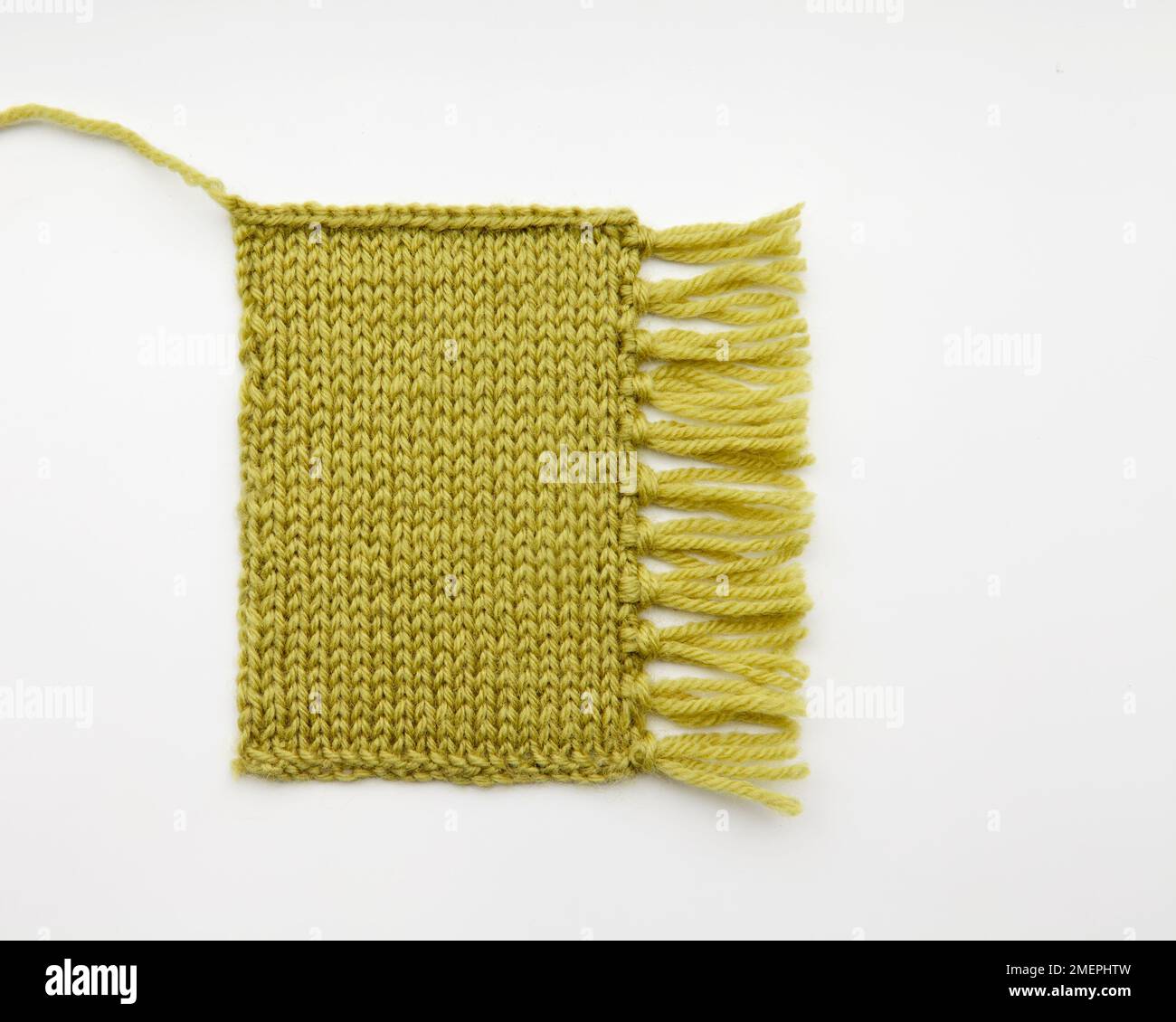 Knitting sample with fringe Stock Photo - Alamy