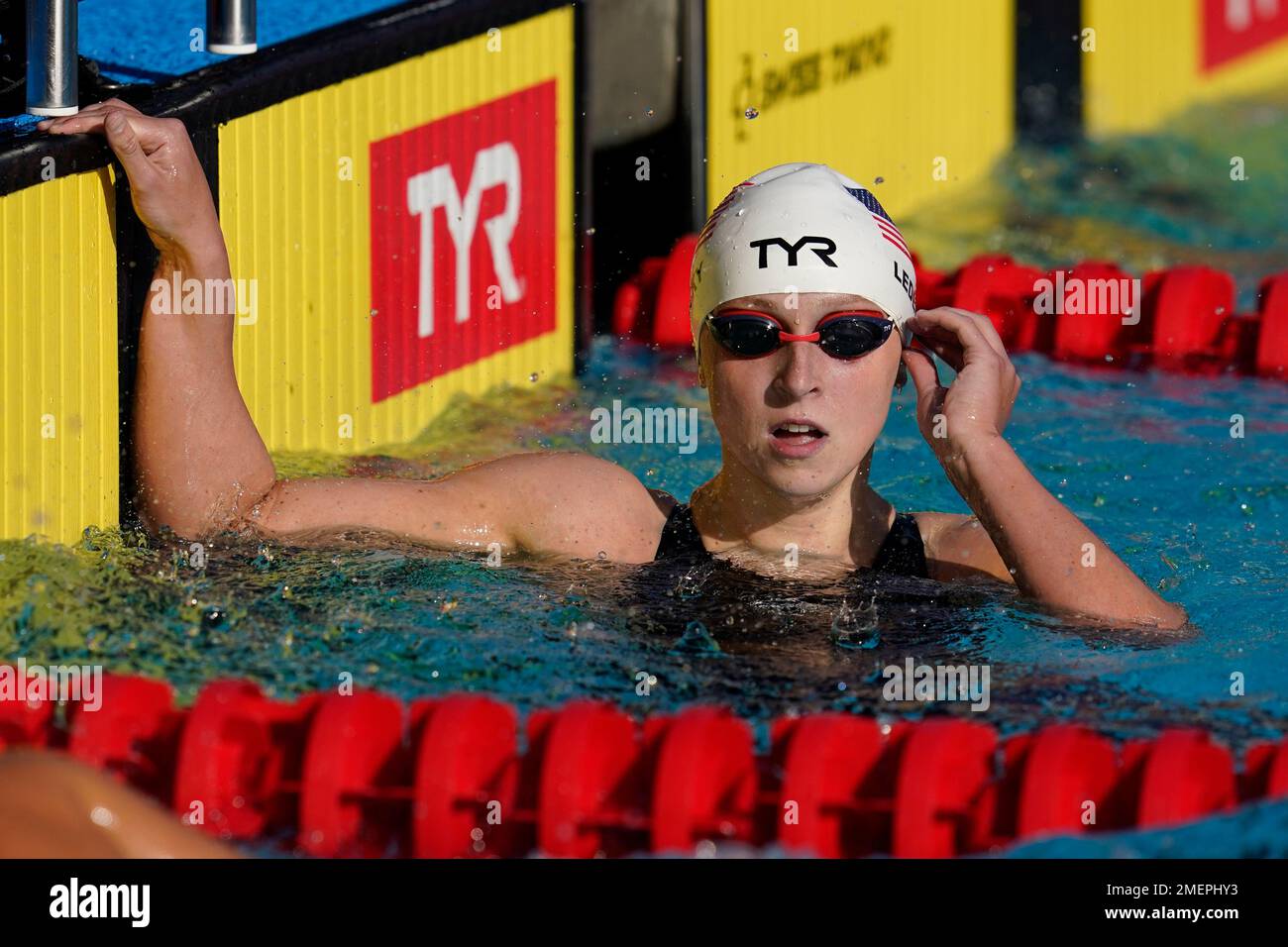 Katie Ledecky pauses after competing in the women's 200 meter freestyle prelim race at the TYR ...