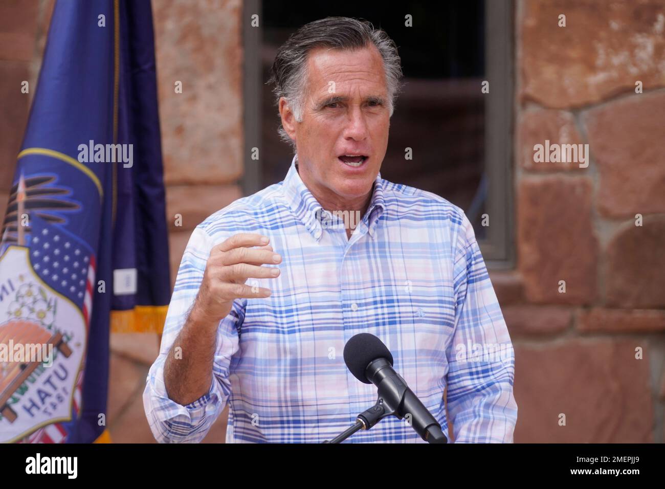 Sen. Mitt Romney speaks during a news conference following a tour with ...