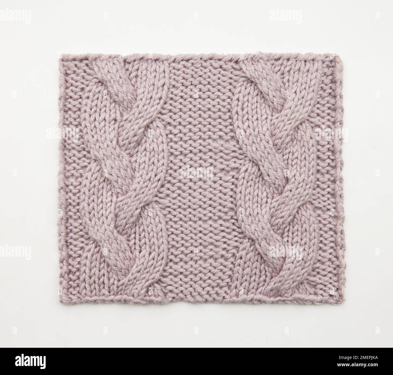 Plait cable stitch knitting sample Stock Photo - Alamy