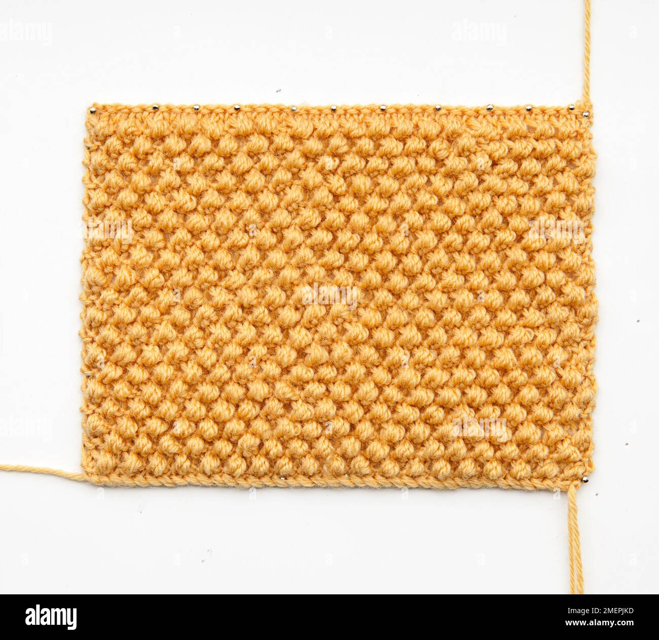 Bobble stitch knitting sample Stock Photo - Alamy