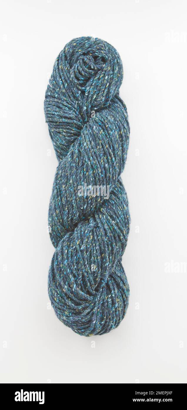 Twist of blue silky tweed yarn Stock Photo - Alamy