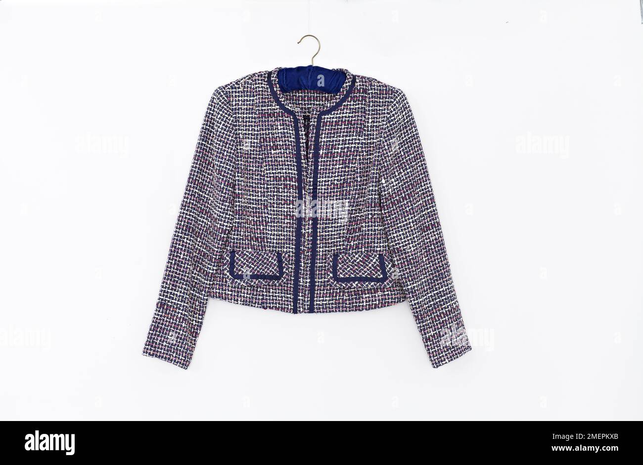 Classic boxy jacket on hanger Stock Photo - Alamy