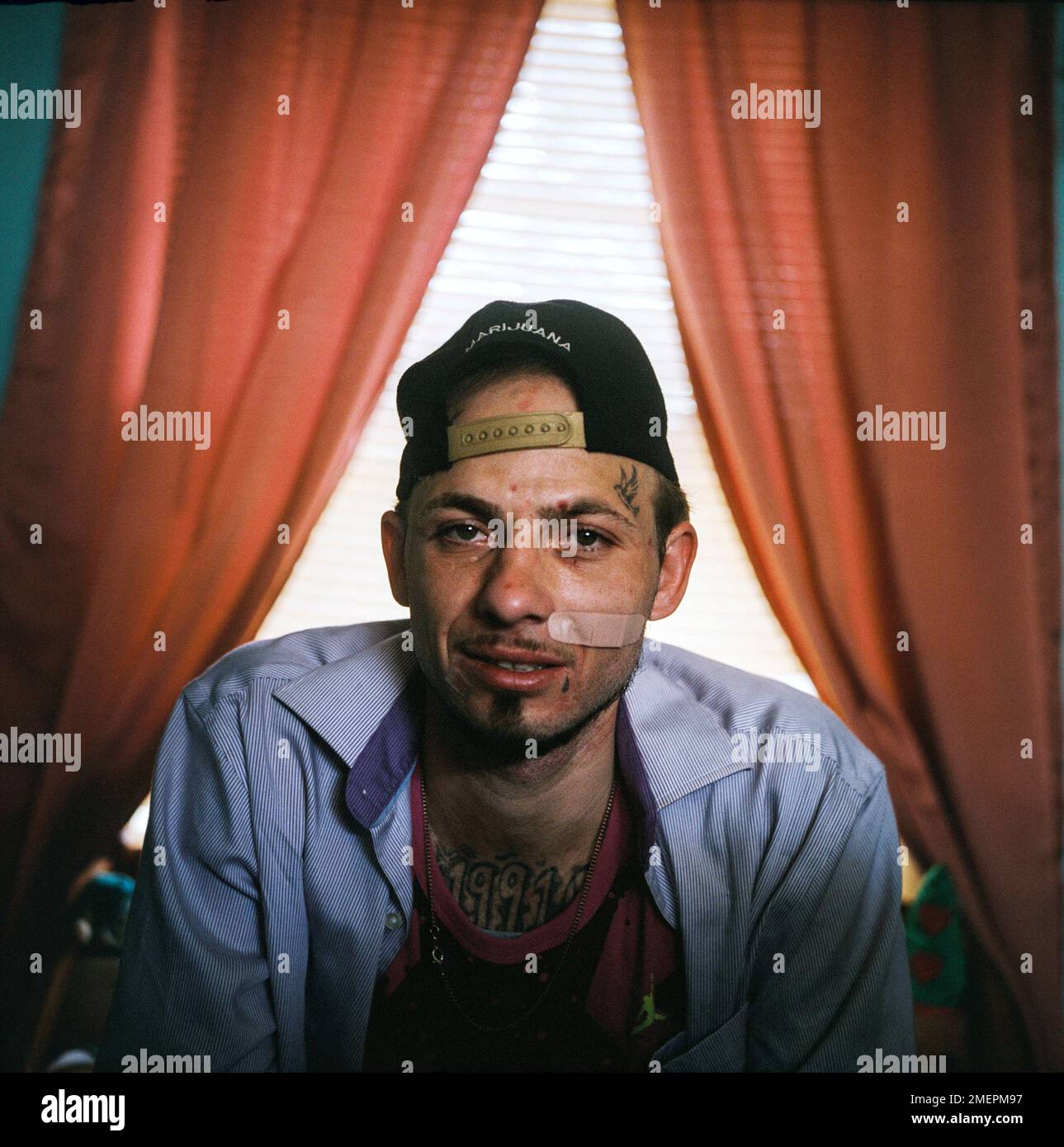 Joshua Messer, 29, is photographed in his aunt's home where he's ...