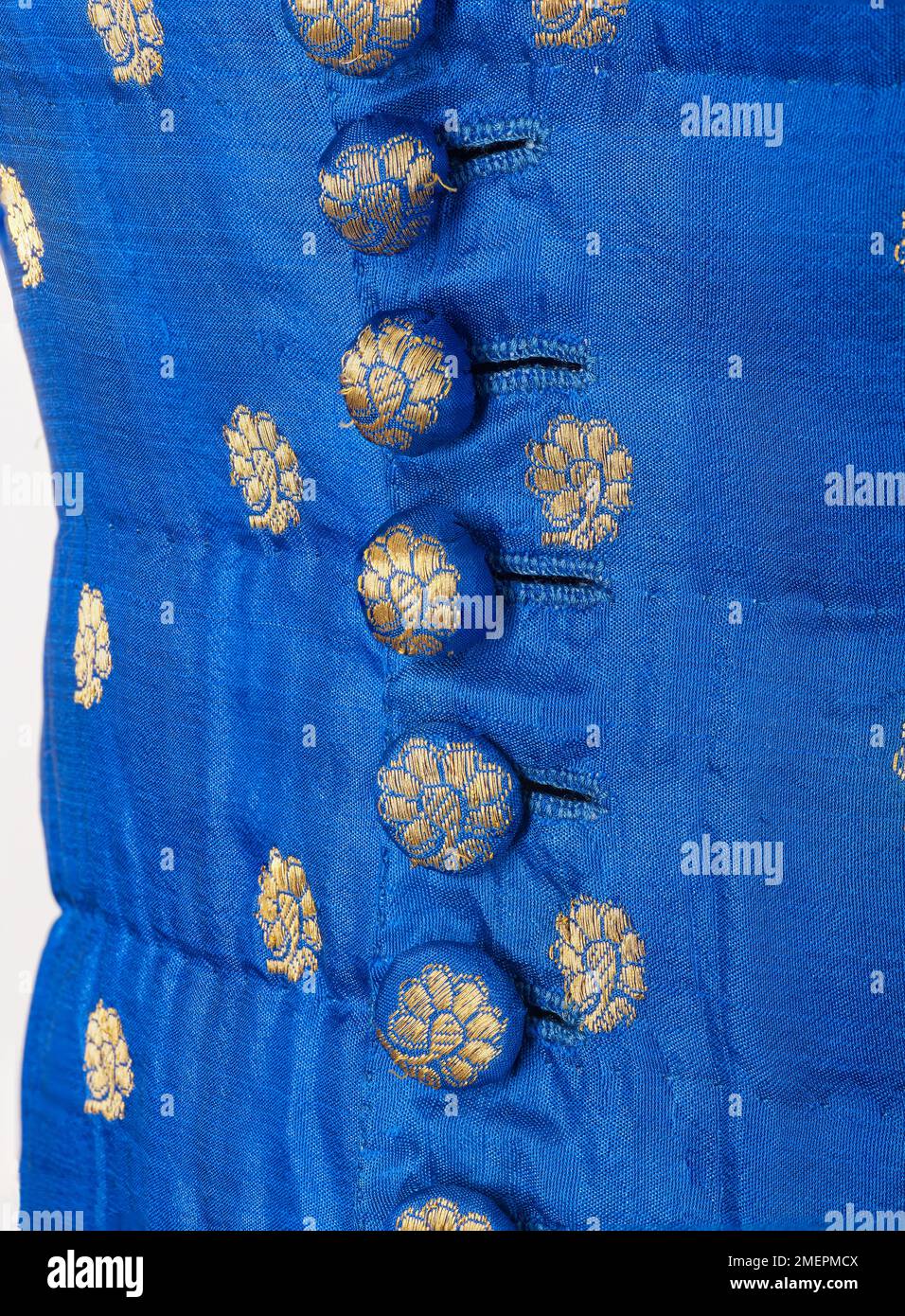 Medieval-style blue silk paltock (doublet) with brocaded gilt leaves ...