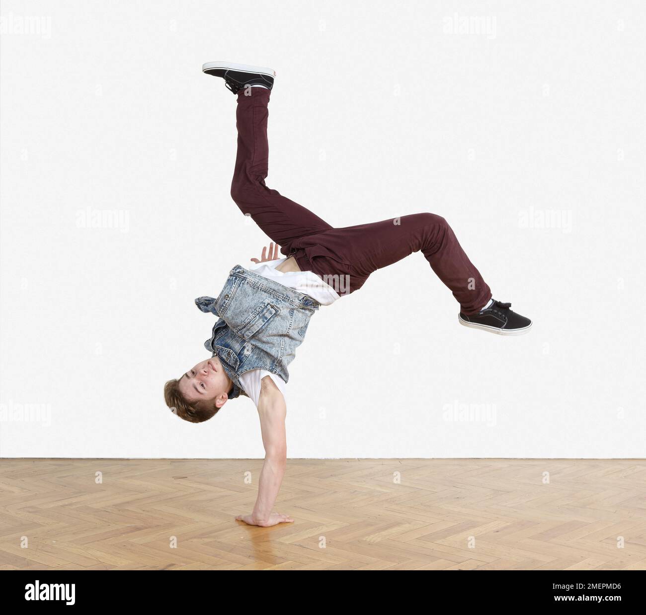 Teenager performing breakdance moves Stock Photo - Alamy