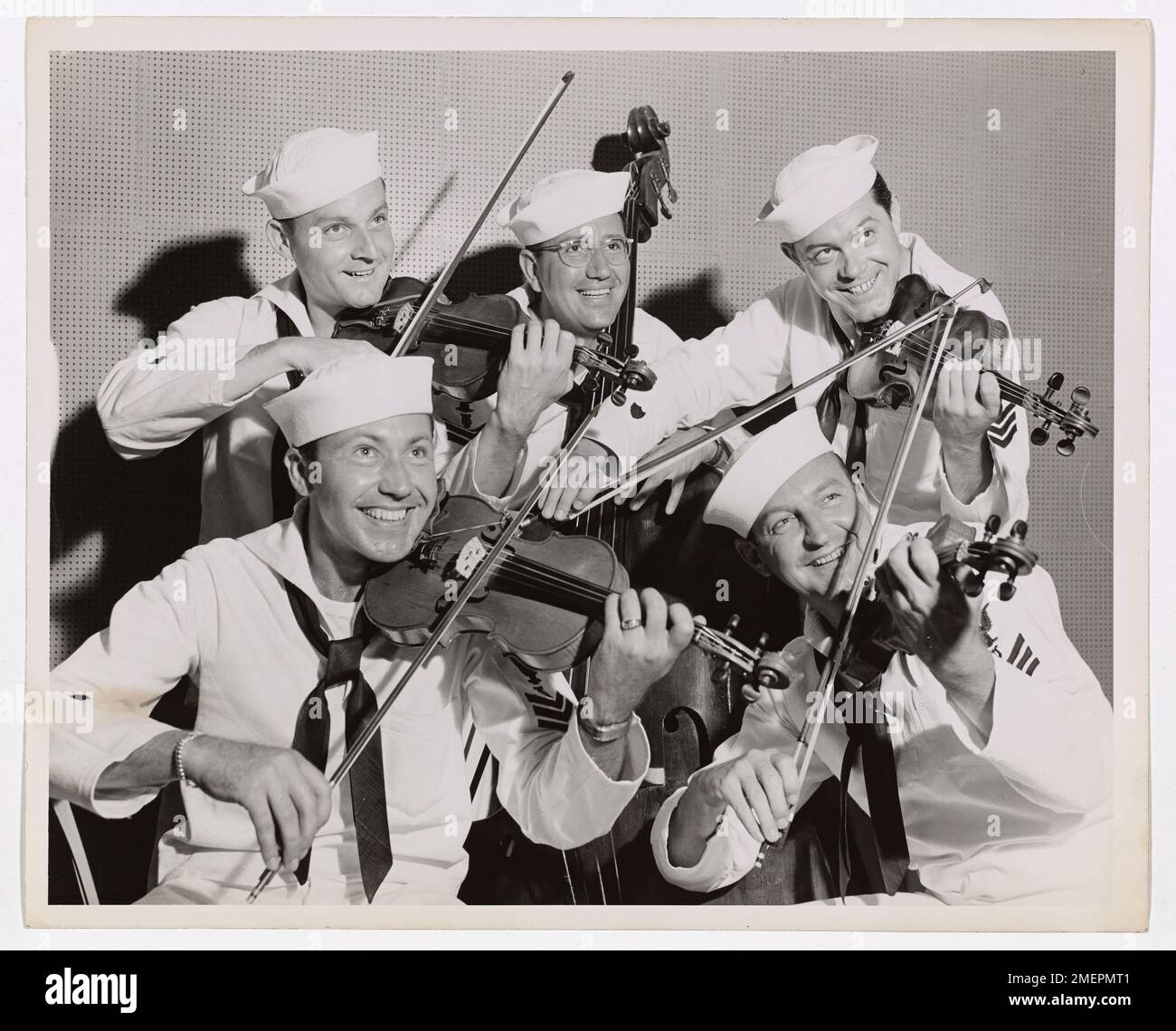 Photograph of a musical ensemble featuring Jim Buchanan, Lou Butterman ...