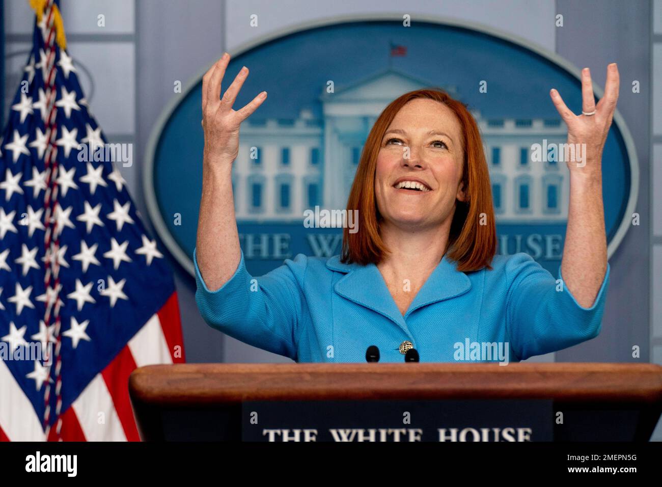White House press secretary Jen Psaki gestures while speaking at a ...