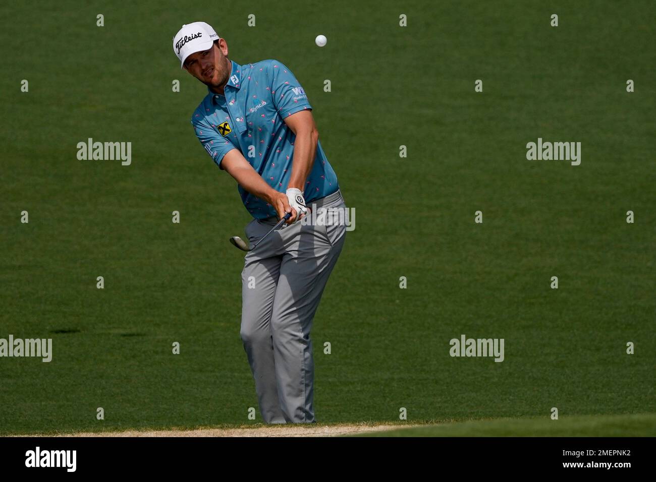 Bernd Wiesberger, of Austria, watches his chip to the second green ...