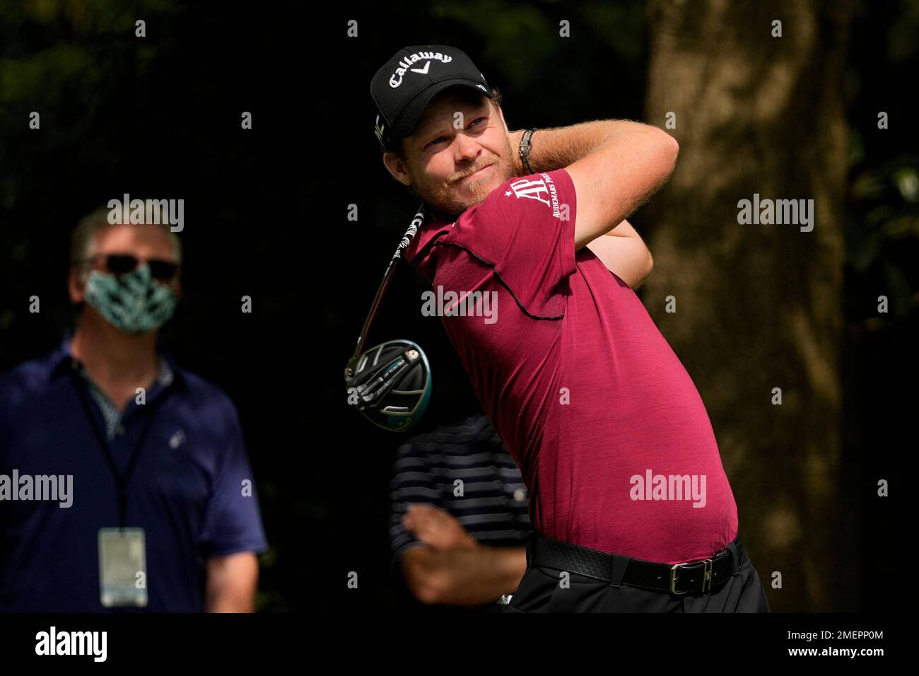 Danny Willet, of England, watches his tee shot on the seventh hole ...