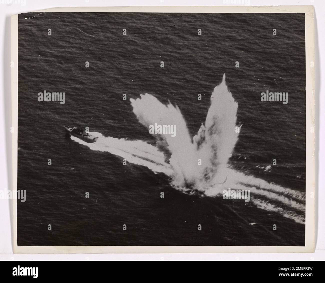 A U.S. Navy blimp, acting as the 'eyes of the sky,' directs a nearby ...