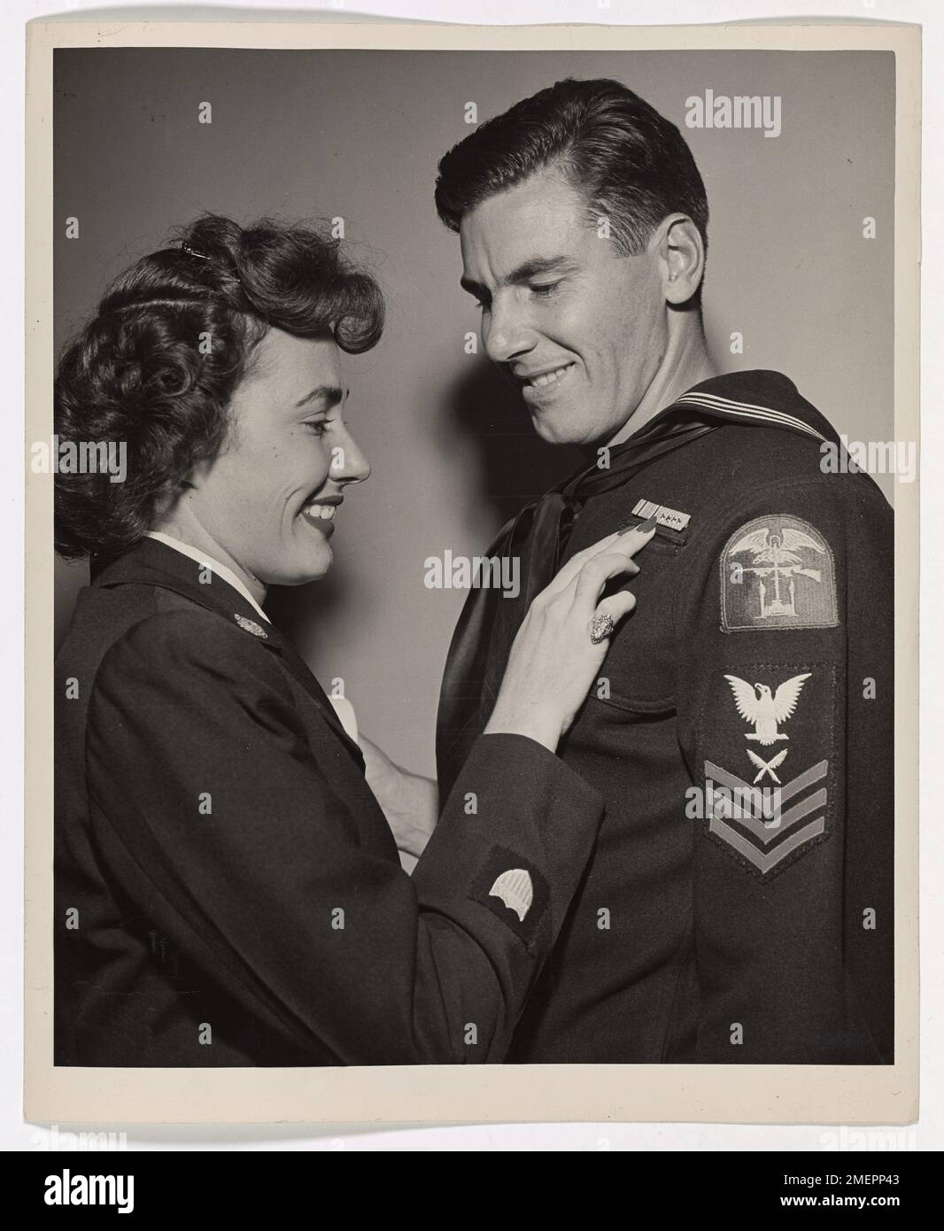 Coast Guardsman John B. Garrett, back from 23 months in the Pacific ...