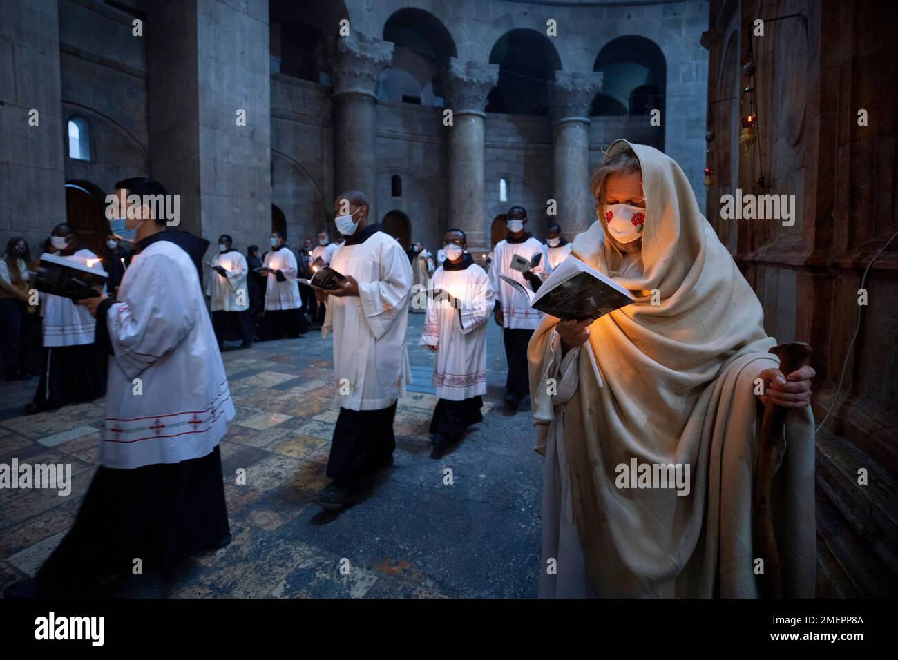 Priests circle the Edicule during Easter Sunday Mass led by the Latin ...