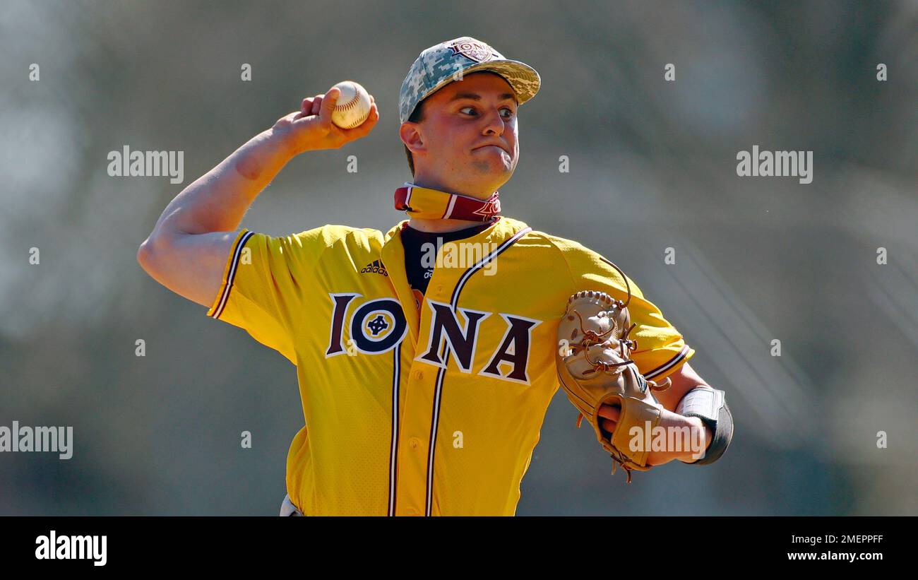 Iona pitcher Clark Eder delivers a pitch against Manhattan during an ...
