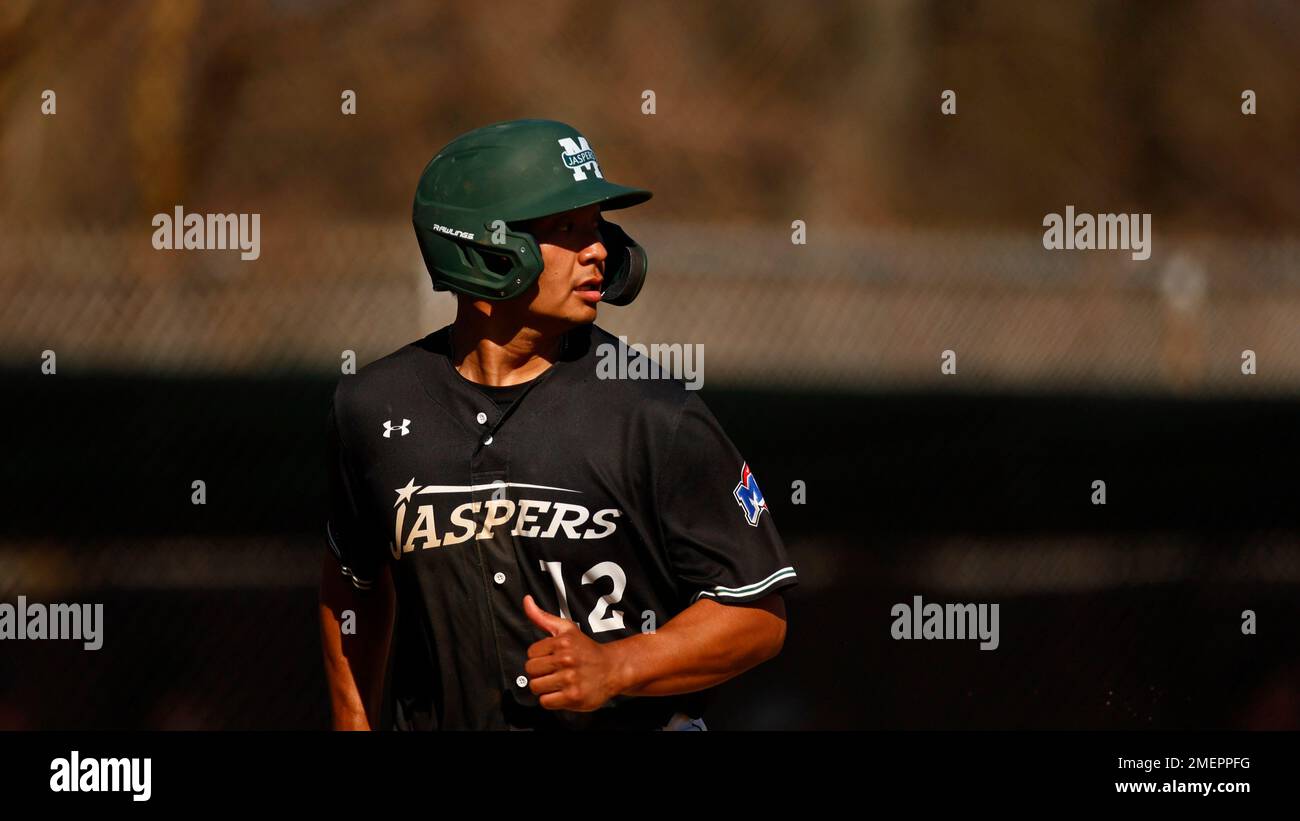 Manhattan's Matt Padre scores a run against Iona during an NCAA ...