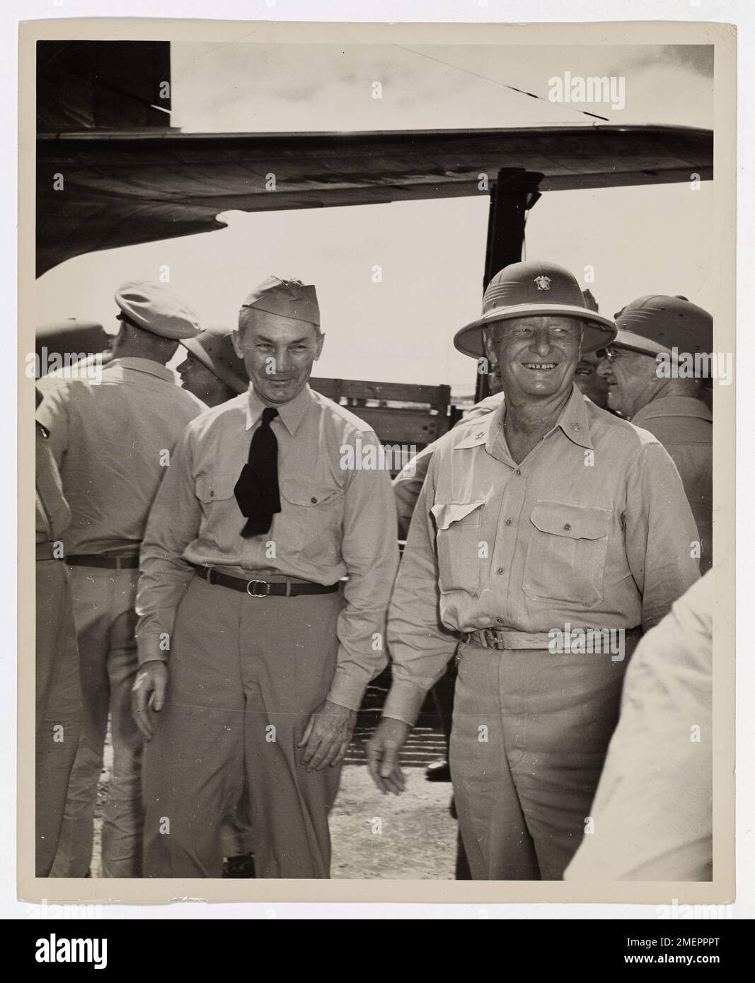 Secretary of the Navy Forrestal and Admiral Chester W. Nimitz are seen ...