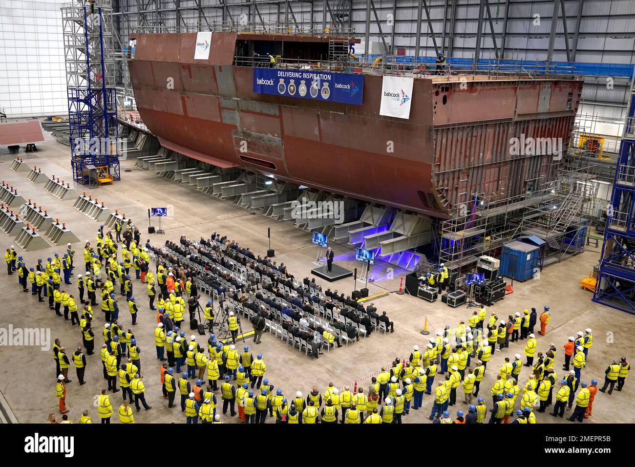 Workers look on at HMS Ventura in the Ventura building which will house ...