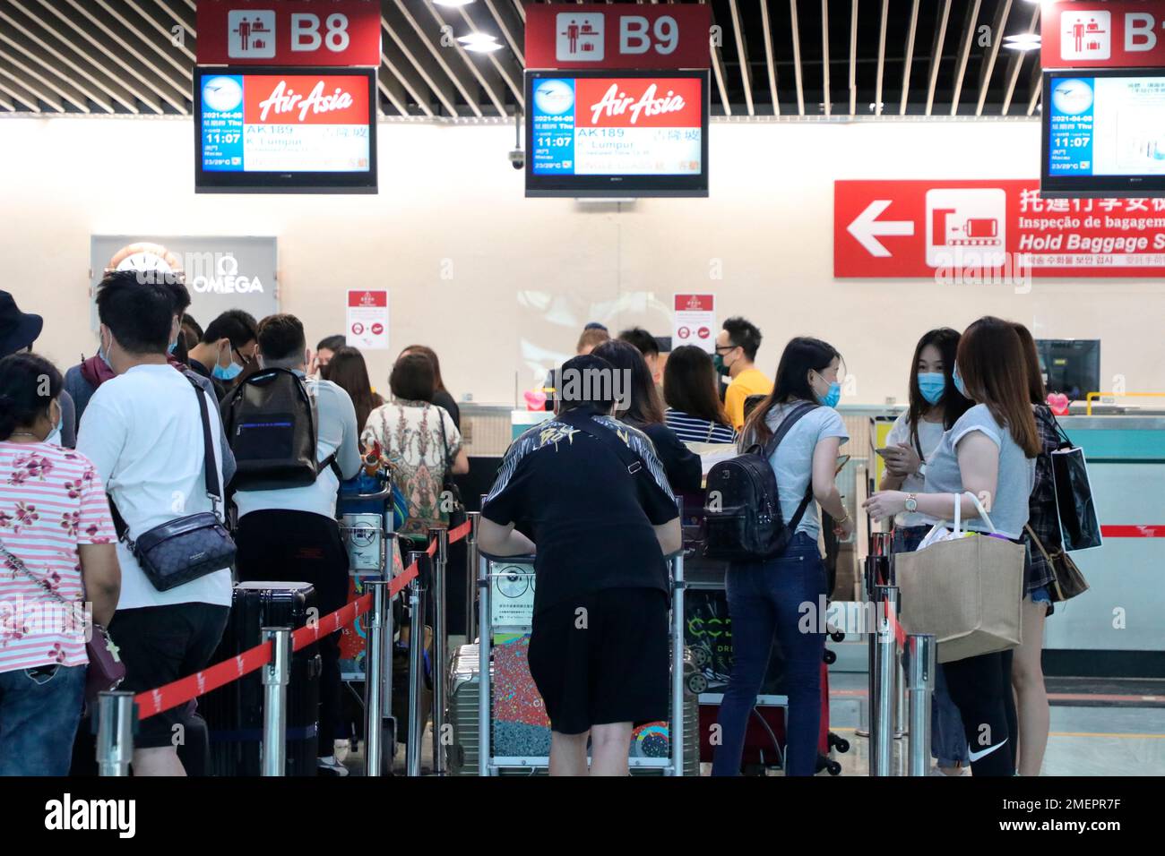 Malaysians and Singaporeans stranded in Macao during pandemic, line up ...