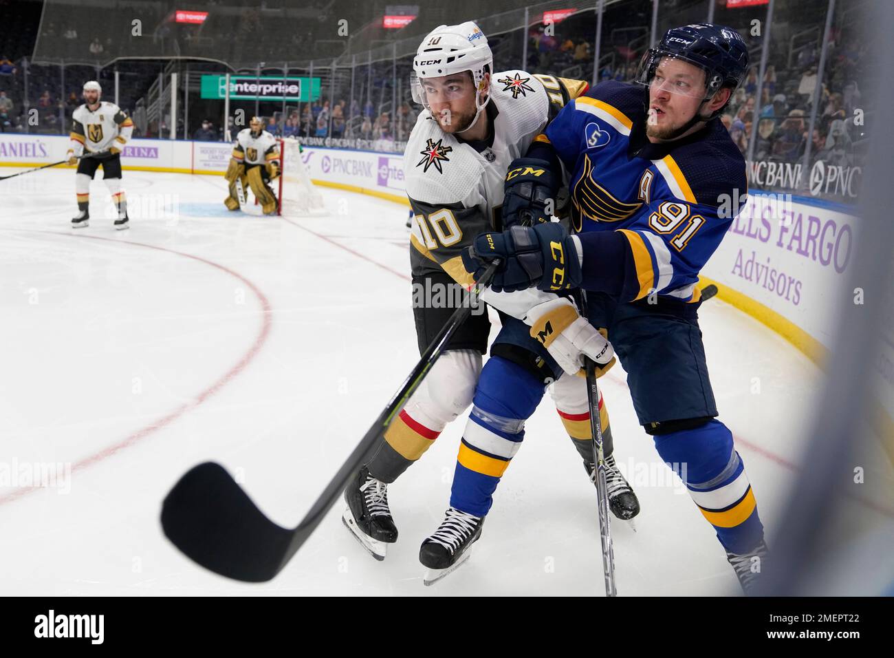 St. Louis Blues' Vladimir Tarasenko, right, gets tangled up with Vegas ...