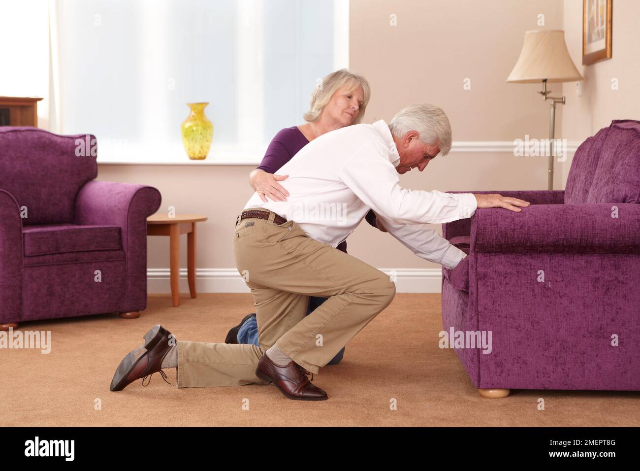 Man falling of a chair hi-res stock photography and images - Alamy