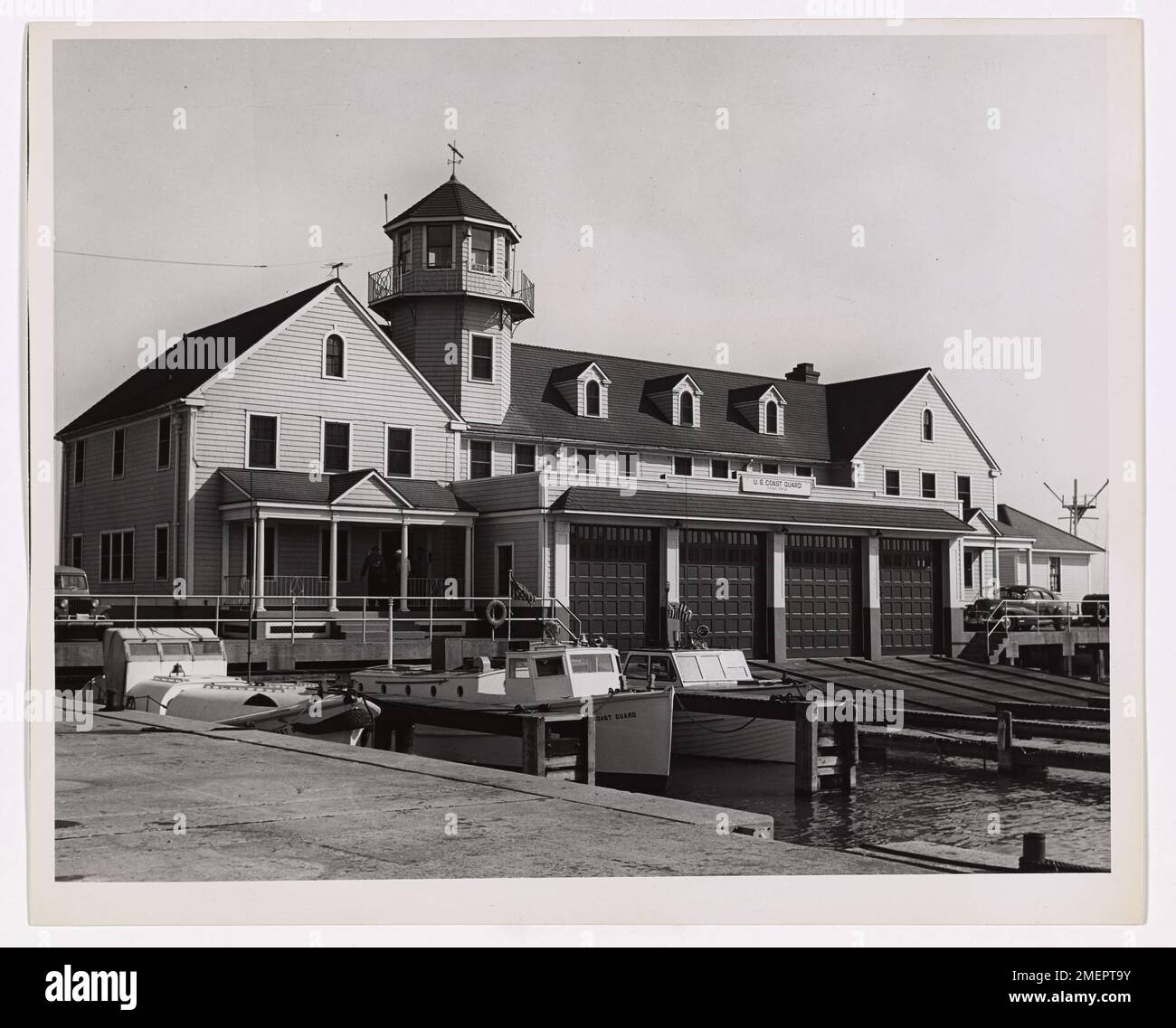 A view looking east at the Chicago Lifeboat Station, with boats moored ...